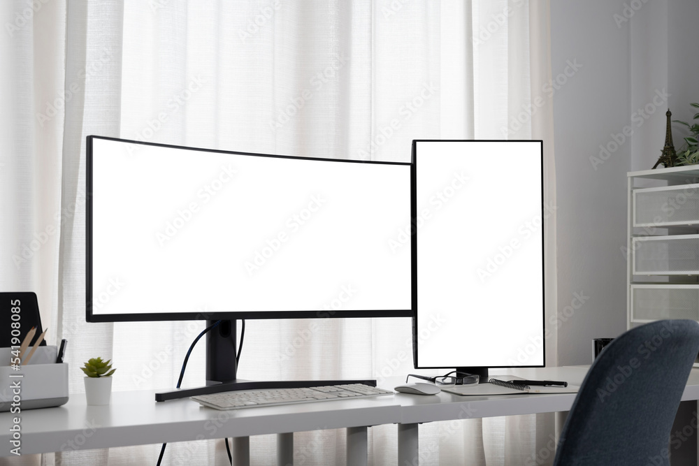 Workspace with curved-screen computer design and vertical monitor on ...