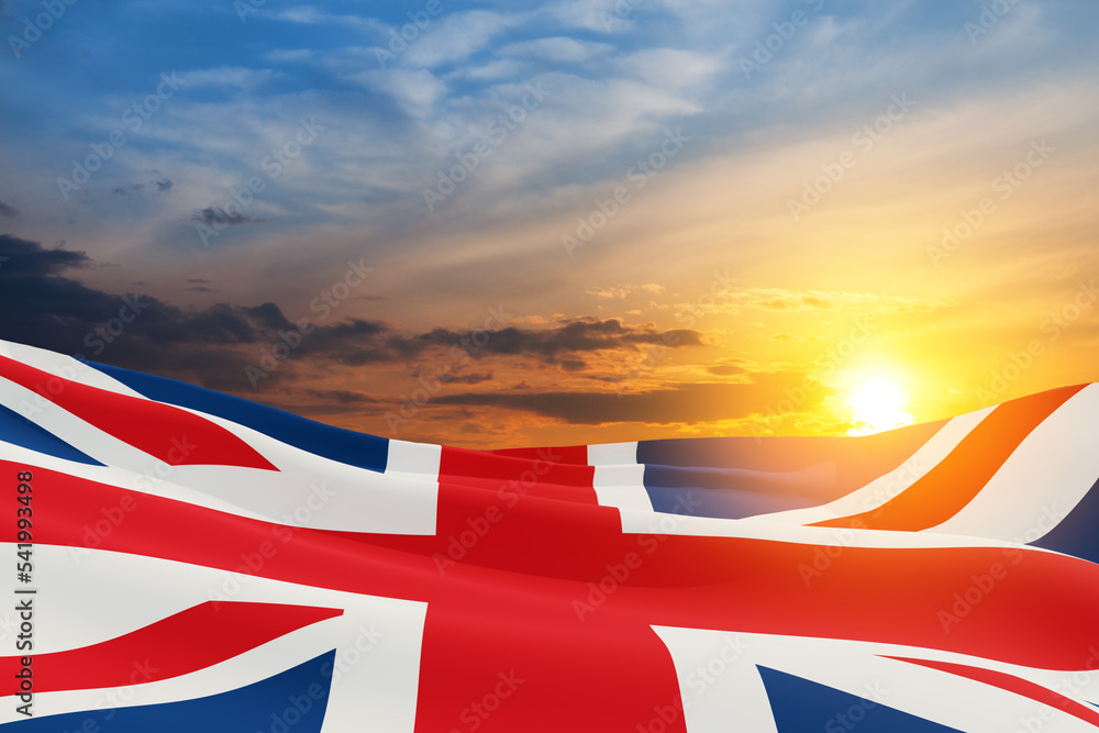 National flags of United Kingdom on sunset sky background. Background ...
