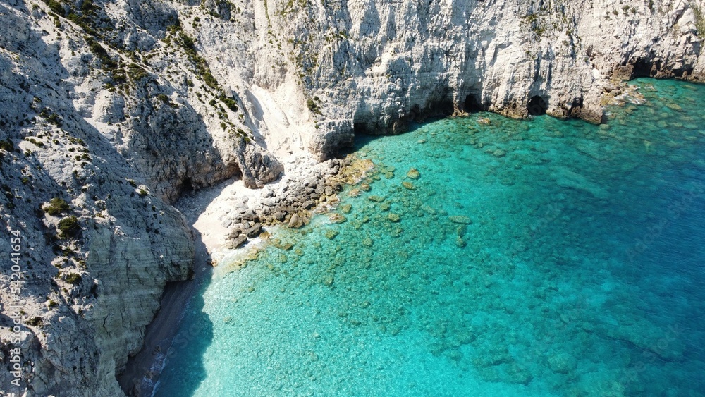 Aerial view of the rocky sea-cliff at Agia Eleni Beach in Kefalonia ...