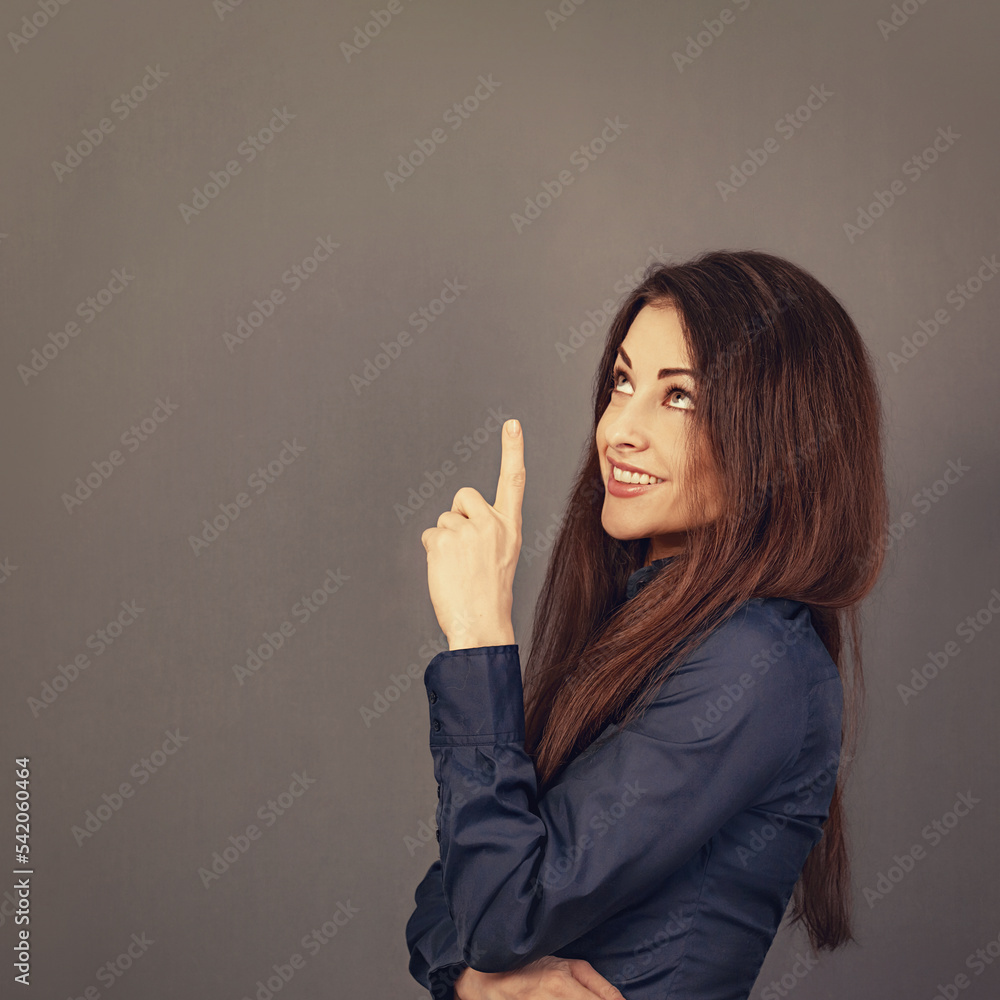 Beautiful positive business happy woman in blue shirt showing the ...