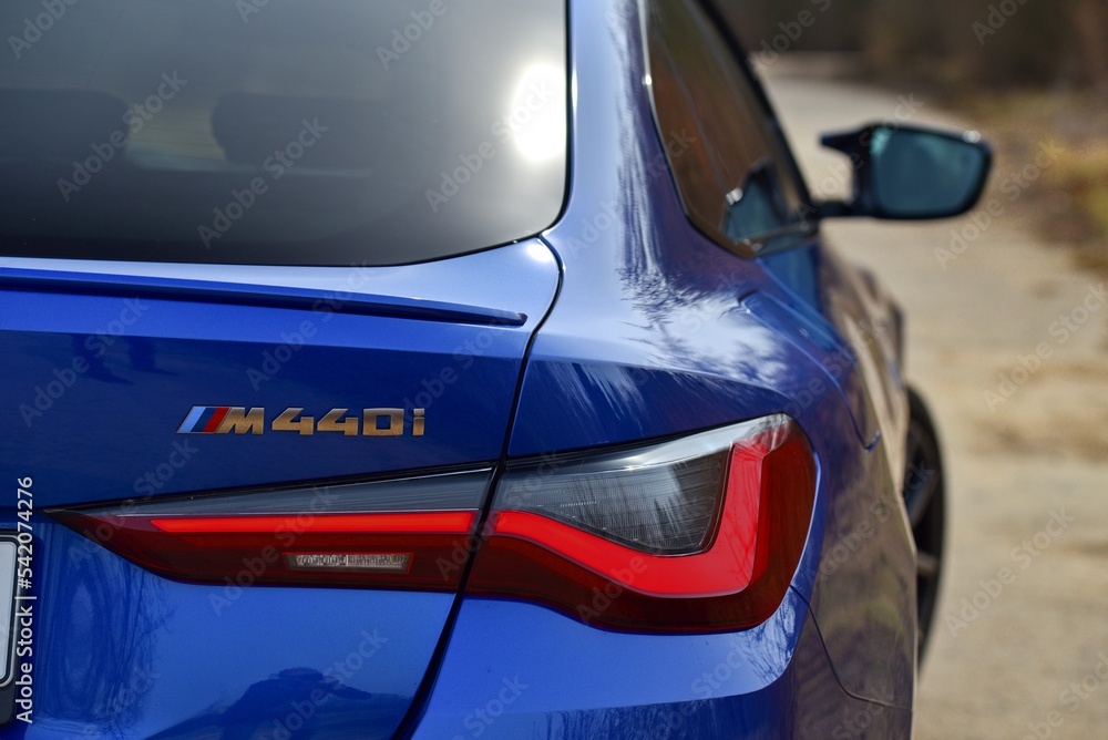 BMW M440i xDrive Gran Coupe. Rear light and type designation on the ...