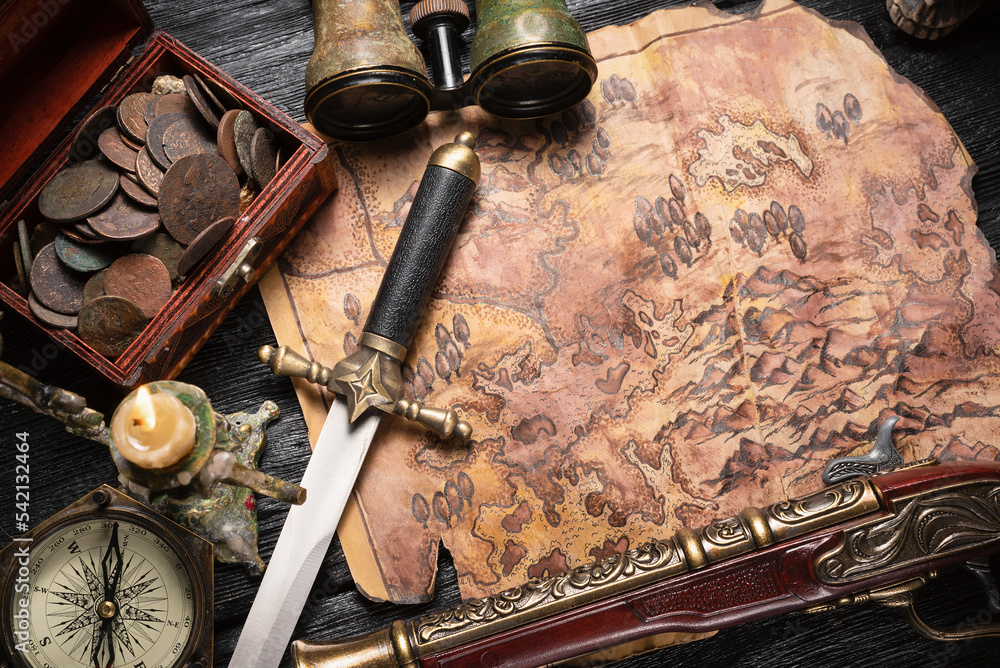Ancient pirate treasure map, compass, chest with ancient coins and ...