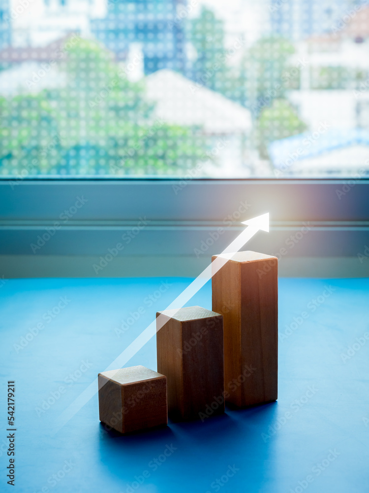 Shining rise up arrows on wooden blocks, 3d bar graph chart steps on ...