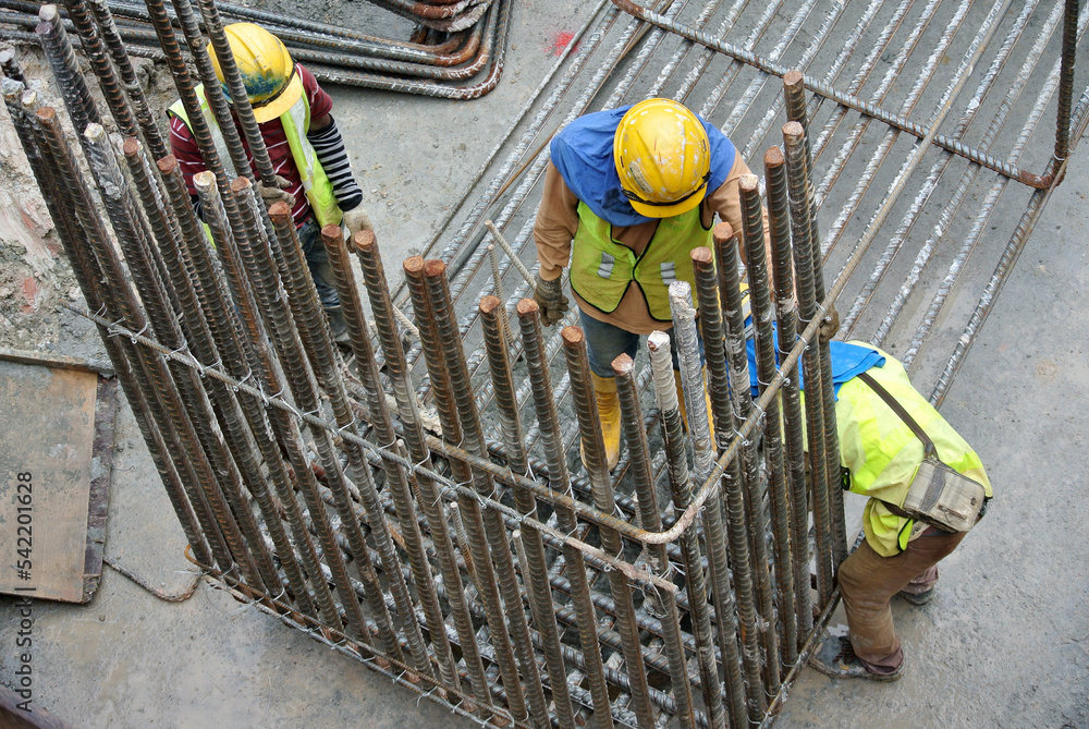 JOHOR, MALAYSIA -APRIL 14, 2015: Construction workers fabricating pile ...