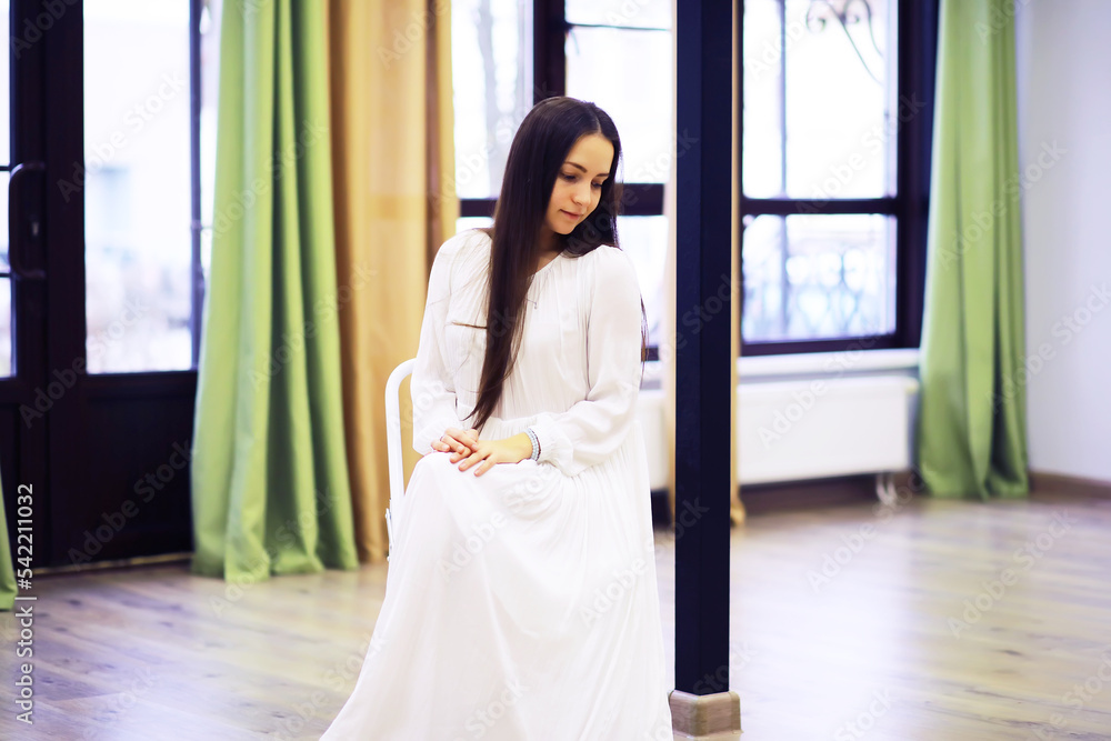 Relaxed serene pretty young woman at home, happy calm lady dream enjoy ...