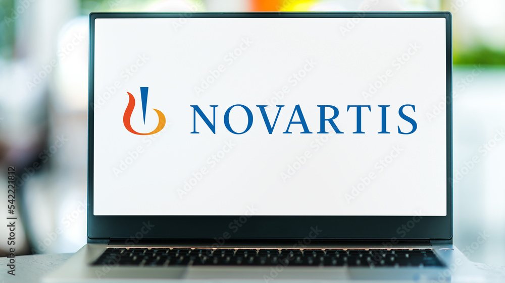 Laptop computer displaying logo of Novartis Stock Photo | Adobe Stock
