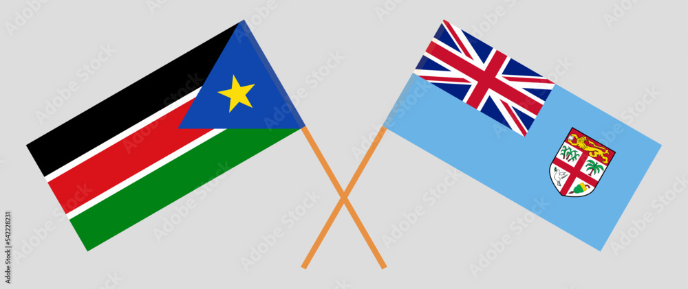 Crossed flags of South Sudan and Fiji. Official colors. Correct ...