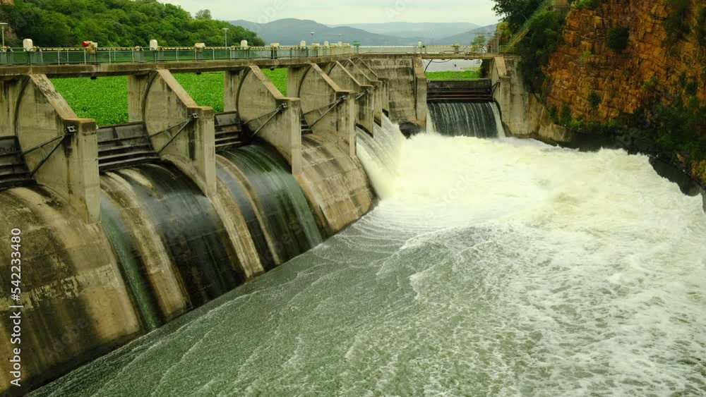 Hydroelectric dam on the river. view of the hydroelectric dam, water ...