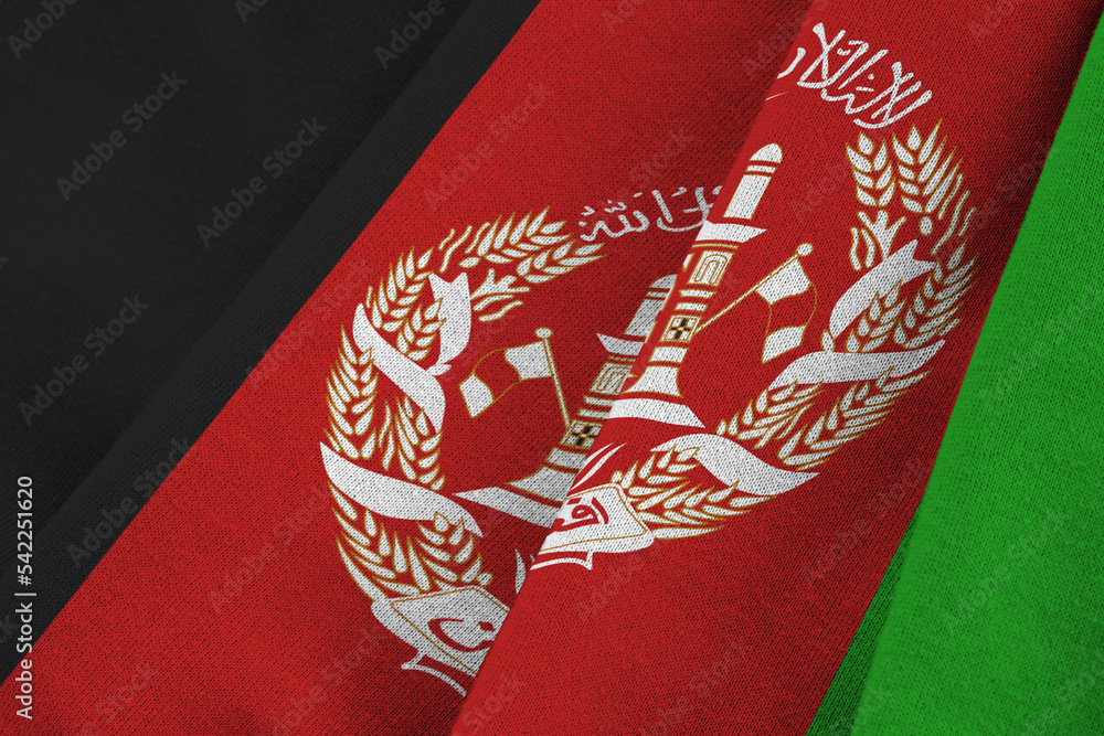 Afghanistan flag with big folds waving close up under the studio light ...