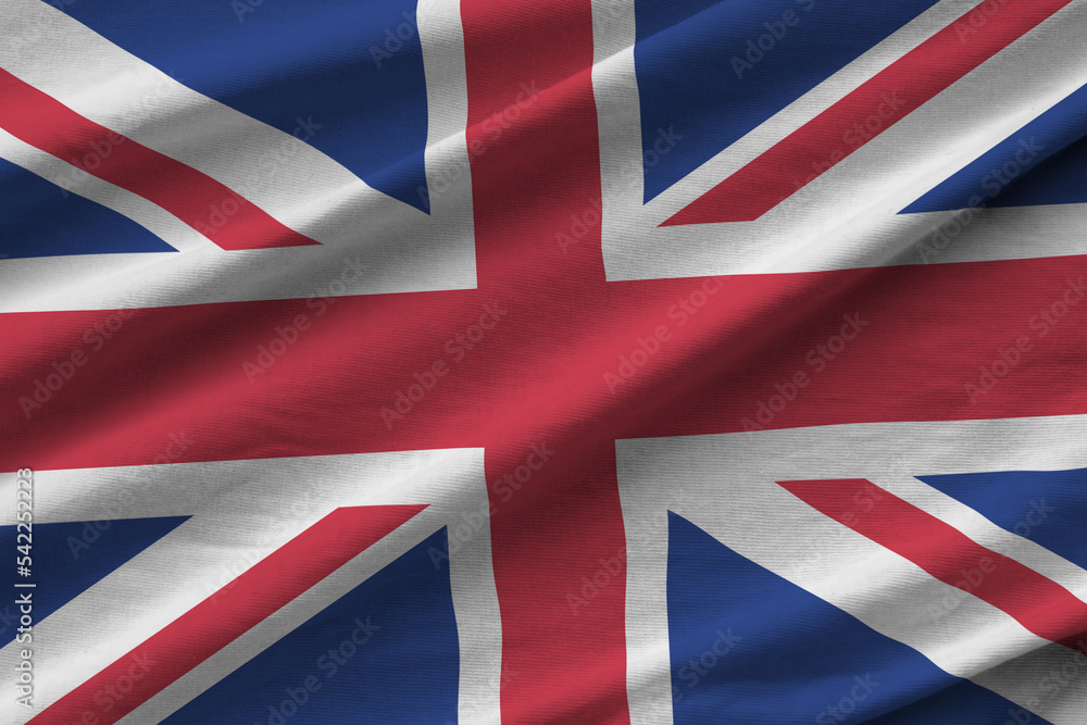 Great britain flag with big folds waving close up under the studio ...