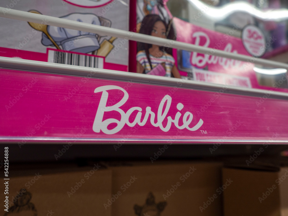 The word Barbie . Barbie dolls on the shelf in the store.Logo. Russia ...
