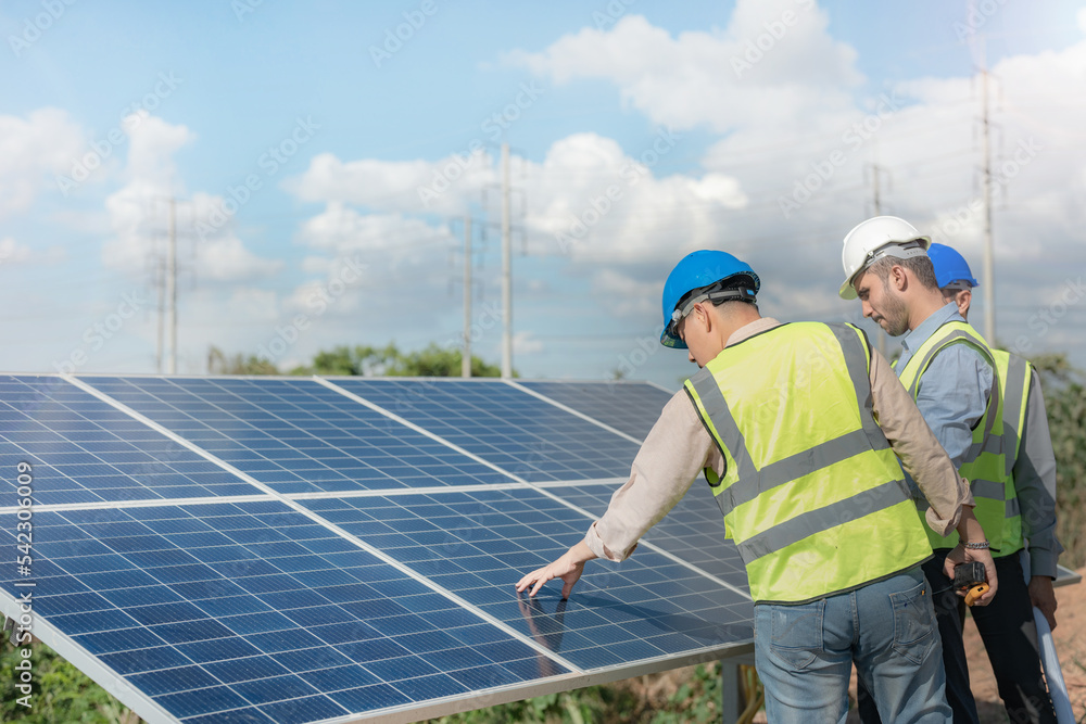 engineer man inspects construction of solar cell panel or photovoltaic ...