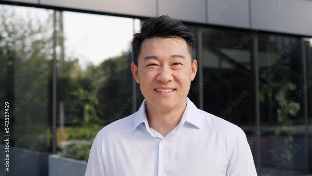 Portrait Face Smile of Attractive Adult Chinese Man looking in to the ...