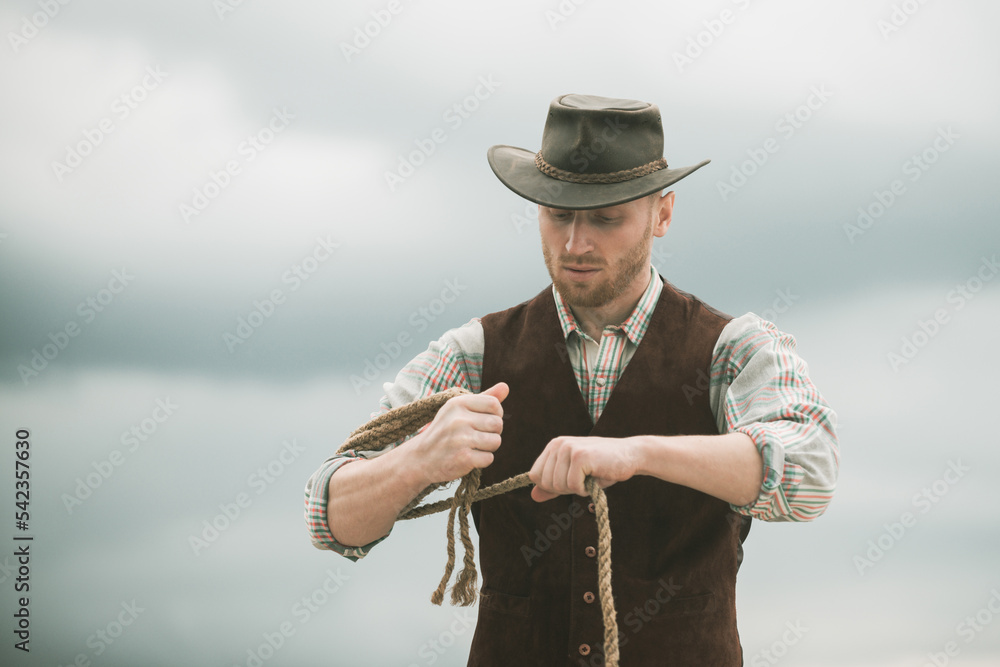 Cowboy wearing hat. Western life. Handsome bearded west farmer ...