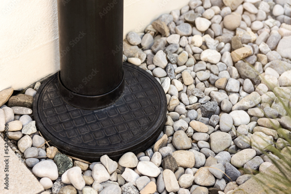 Drain Pipe into Ground Floor with Drain Stones Outside Building. French ...