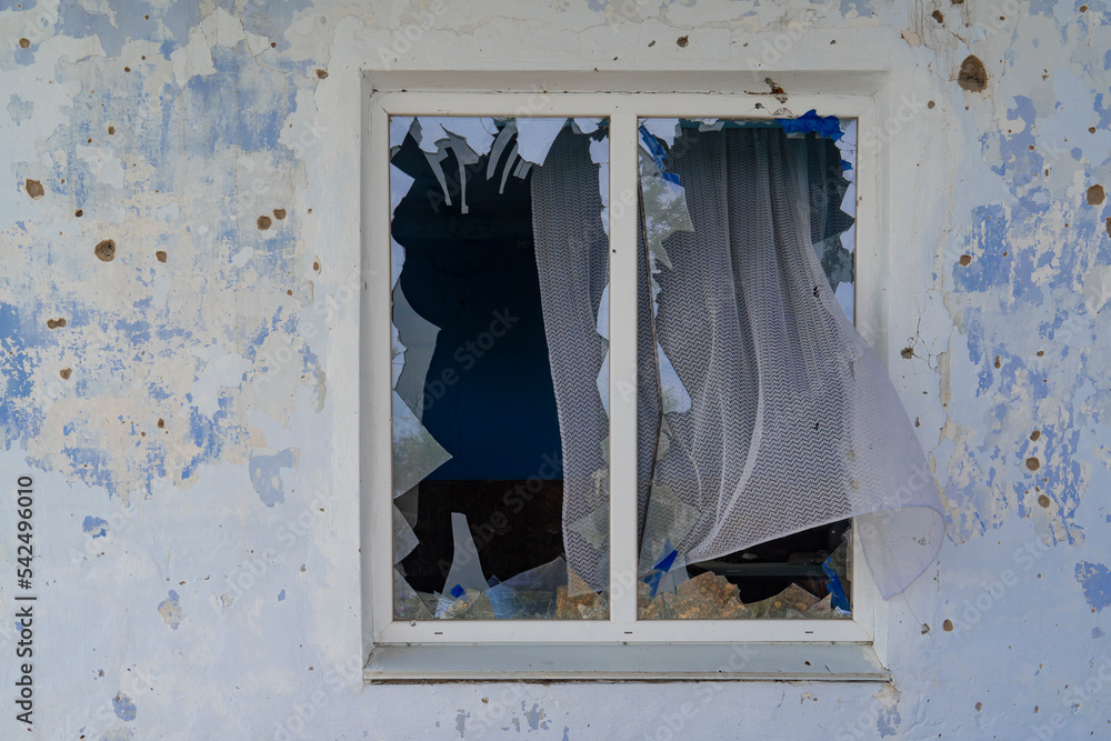 War in Ukraine. 2022 Russian invasion of Ukraine. Window of a house ...