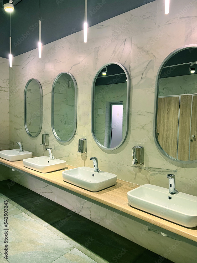 Modern restroom interior with stone gray tiles. Contemporary interior ...