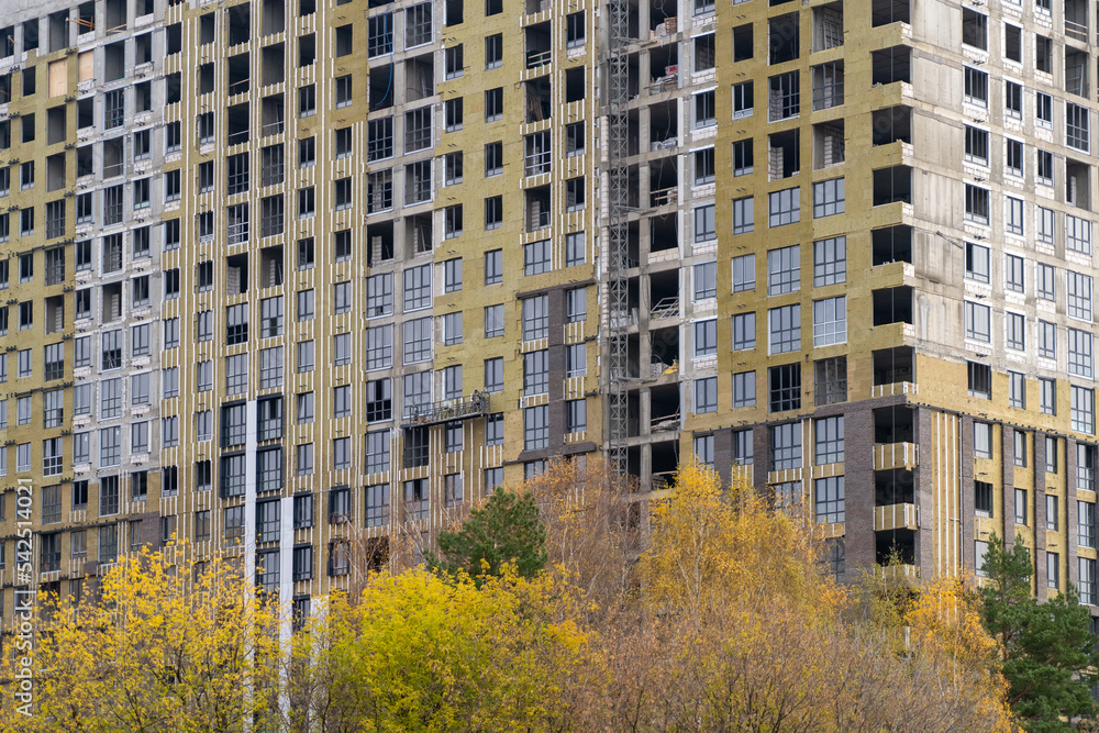 Installation of external wall thermal insulation with rock wool ...