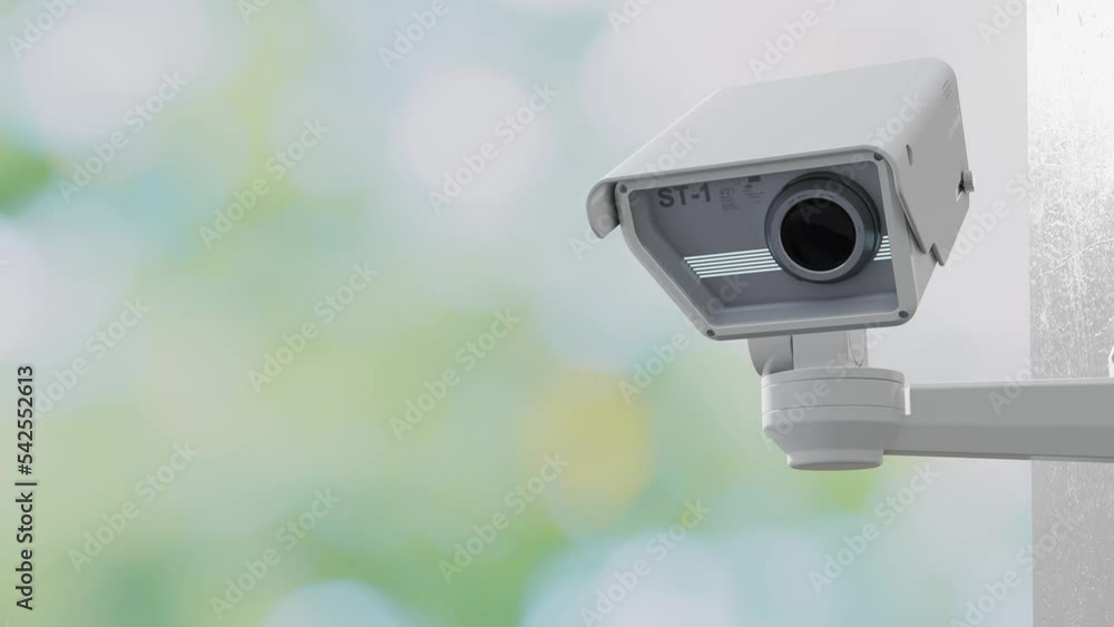 CCTV camera security installed on wall of the building. Scan the area ...