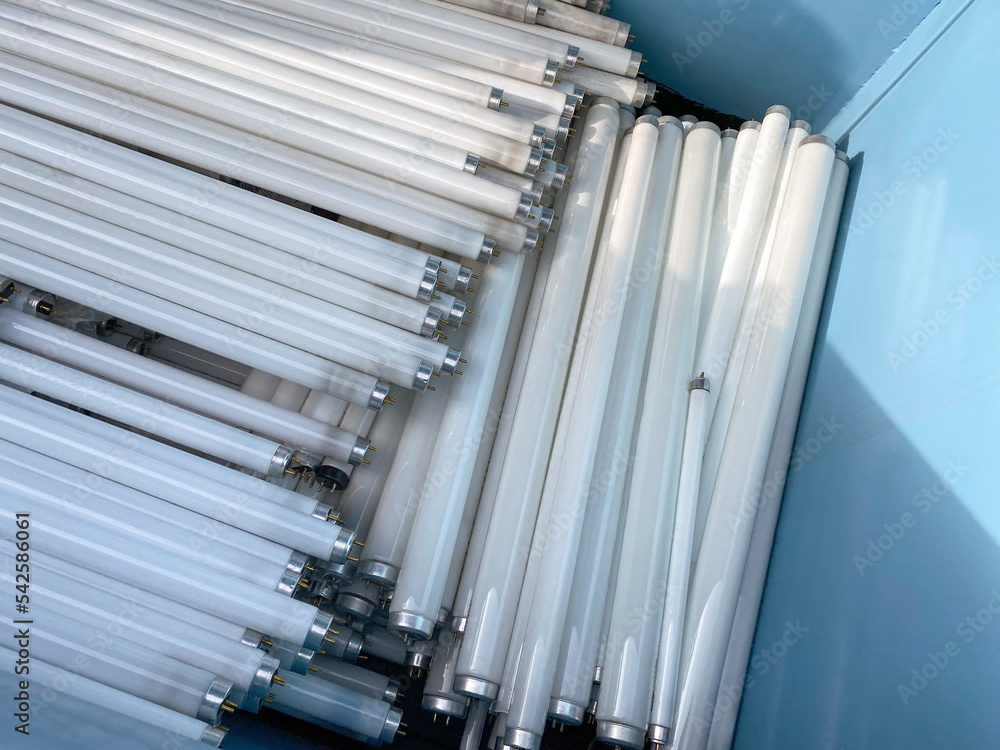 Heap of Uld used Fluorescent light tube lamps in dump trash, recycled ...