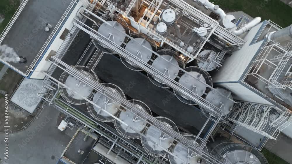 Industrial landscape, large processing factory, view of steel pipes and ...