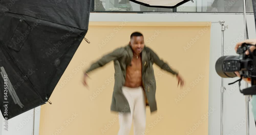 Fashion, studio photoshoot and a black man or model jumping on studio ...