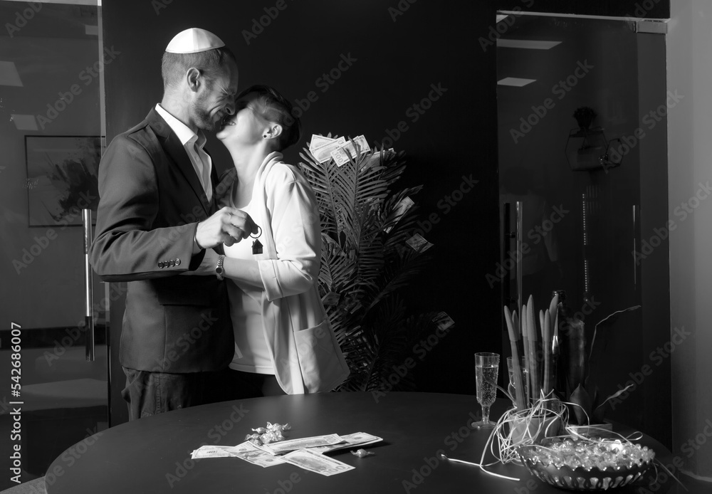 Cool jewish couple hugs together, sincere emotions. Two happy people ...