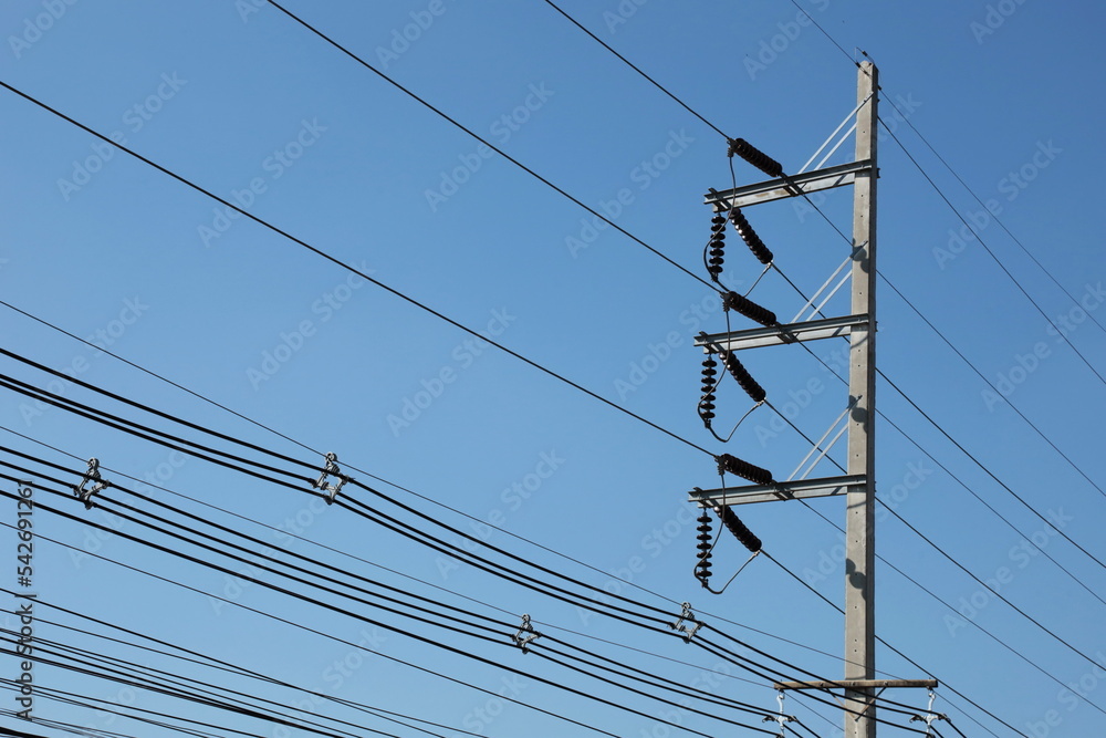 Electric poles with high voltage wires on the poles. Transmission lines ...