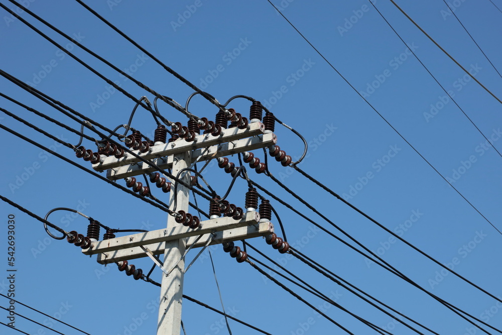 Electric poles with high voltage wires on the poles. Transmission lines ...