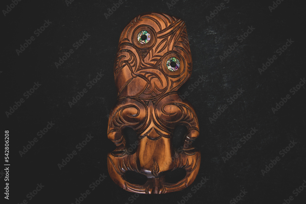 Wooden Maori Hei Tiki hand carved with paua shell eyes. New Zealand ...