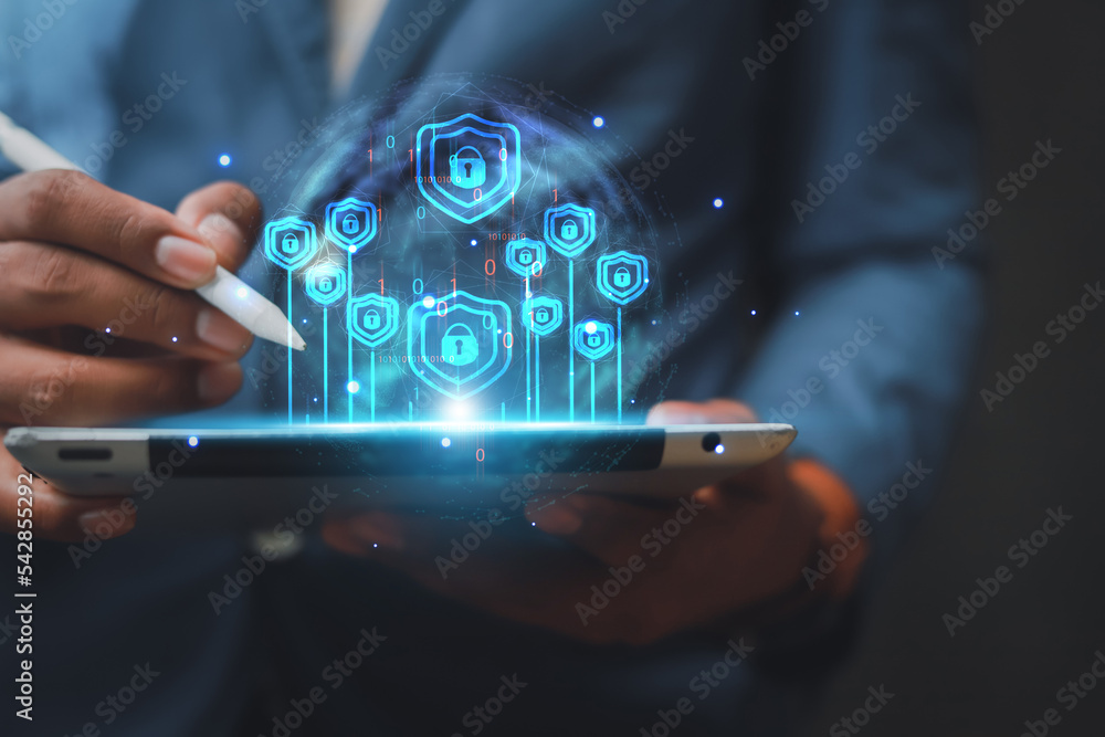 cybersecurity concept Business man shows how to protect cyber technology network from attack by ...