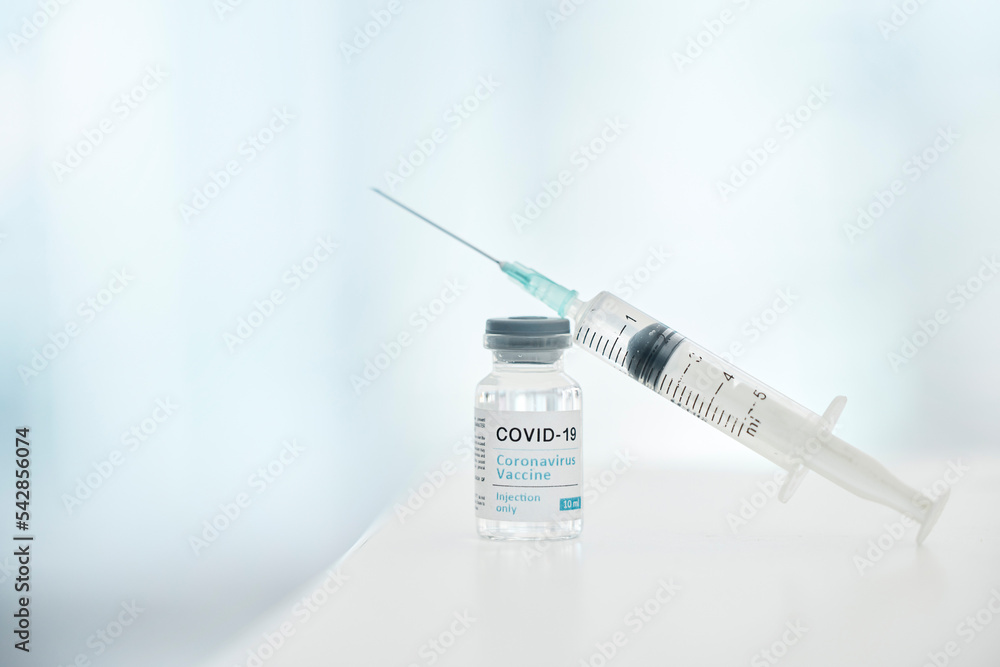 Covid, vaccine and syringe with bottle for safety, health and ...
