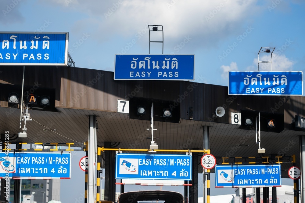 Photo & Art Print View of blue easy-pass road signs at a checkpoint ...
