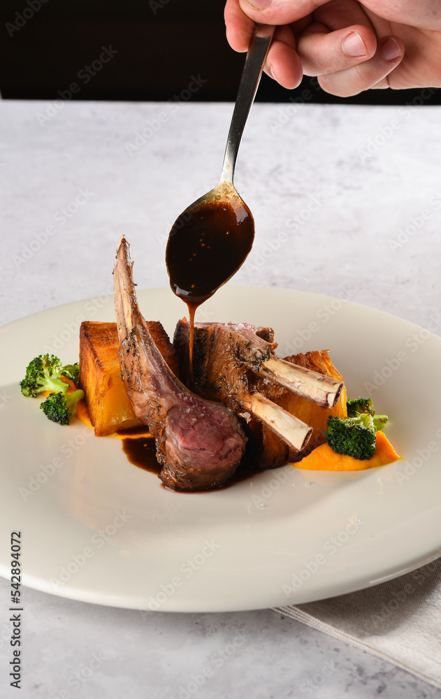 Photo Fine dining, roasted Lamb chops with potato, rosemary and ...