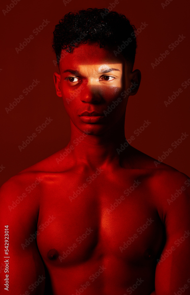 Beauty, red light and man in studio for health, wellness and skincare ...