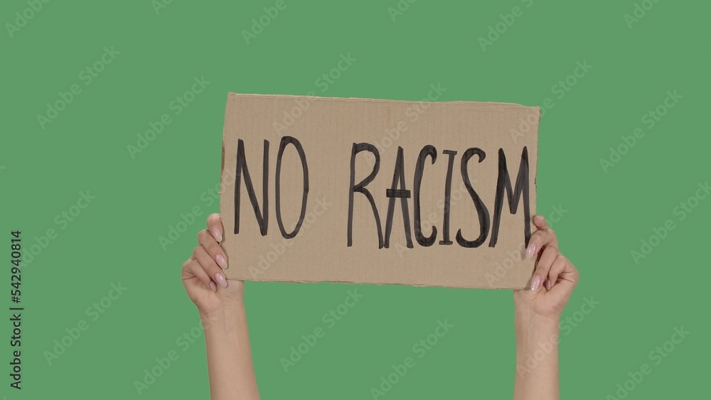 NO RACISM. Protest text message on cardboard. Stop racism. Police ...