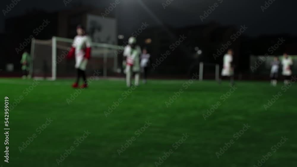 Soccer player takes a direct free kick near penalty area, defensive ...