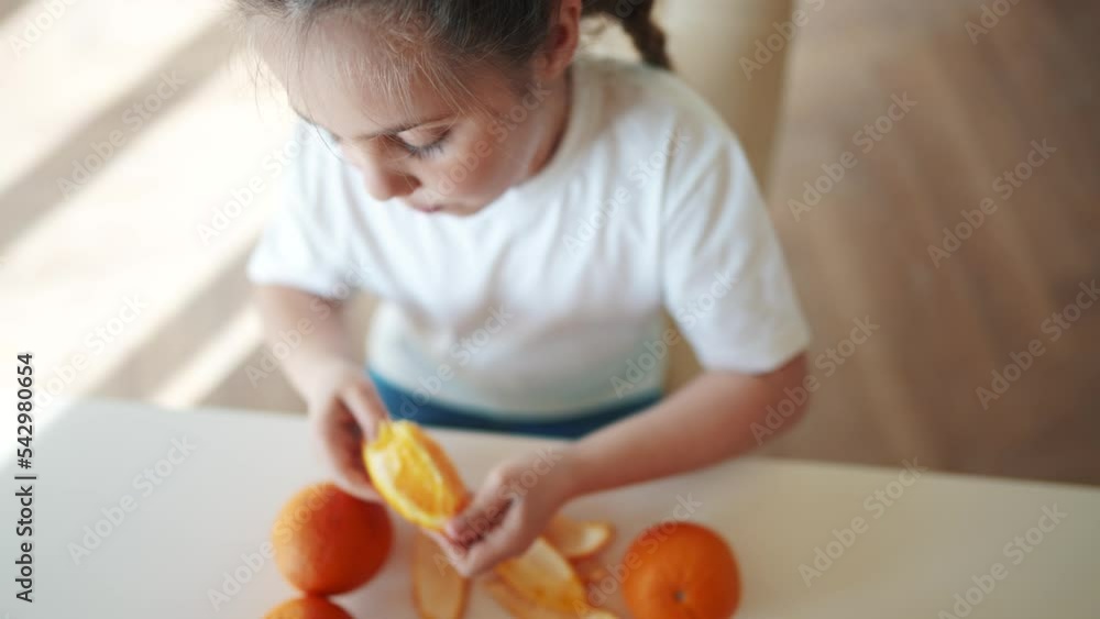 girl child eating oranges. dream happy family fruit healthy food kid ...