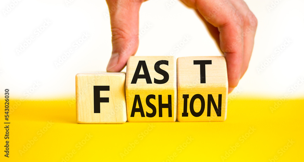 Fast fashion symbol. Concept words Fast fashion on wooden cubes ...