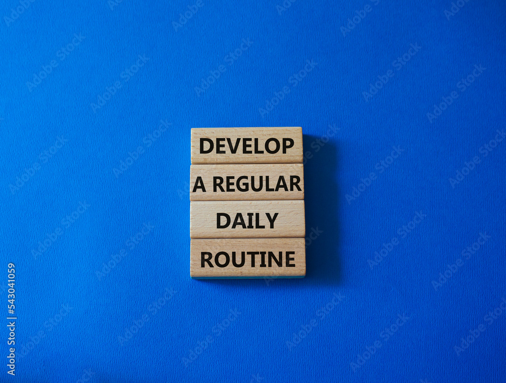 Develop a regular daily routine symbol. Concept words Develop a regular ...
