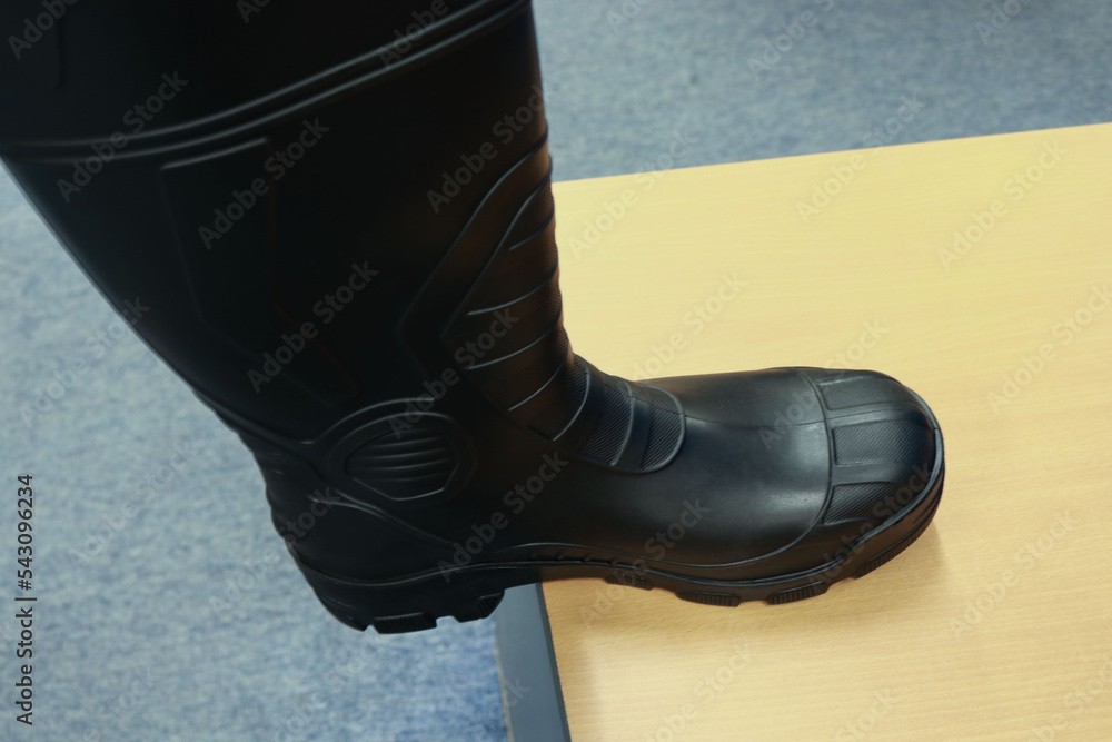 Black rubber boots, these rubber boots are usually worn by mining and ...