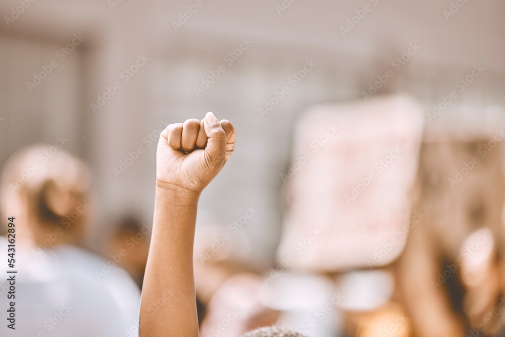 Protest, equality and fist in air in city, crowd of people in street ...