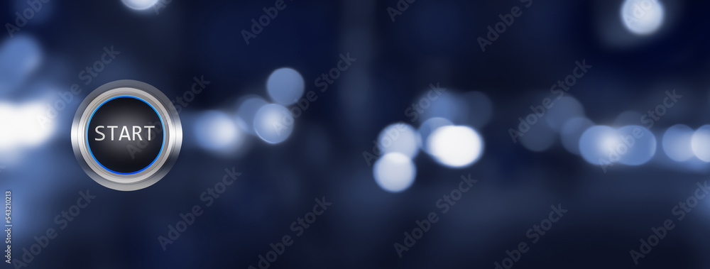 start button on blurred street lights at darl blue night, symbolic ...