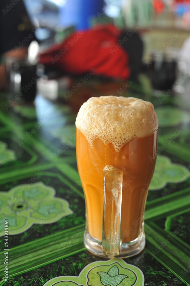 Teh tarik or teh tarik milk. is a hot milk tea beverage very popular in ...