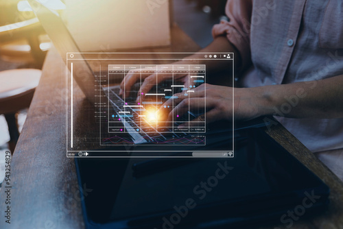 Analyst working with computer in Business Analytics and Data Management ...