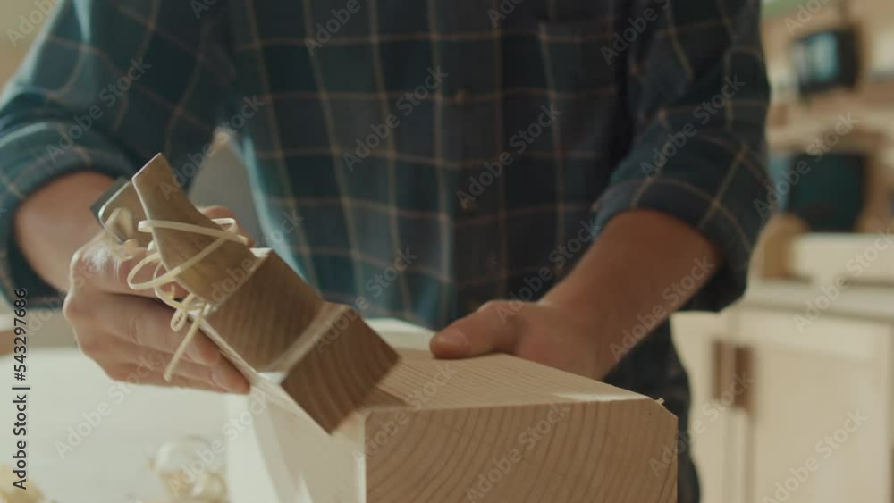 Close-up of Artisan Craftsman Hands Using Hand Plane to Shape a Wood ...