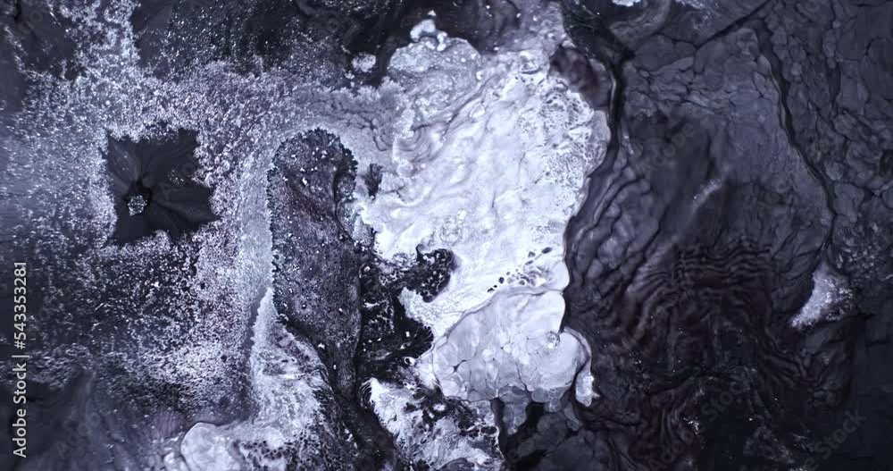 Abstract black-silver flowing ink background. Dark black-white paint ...