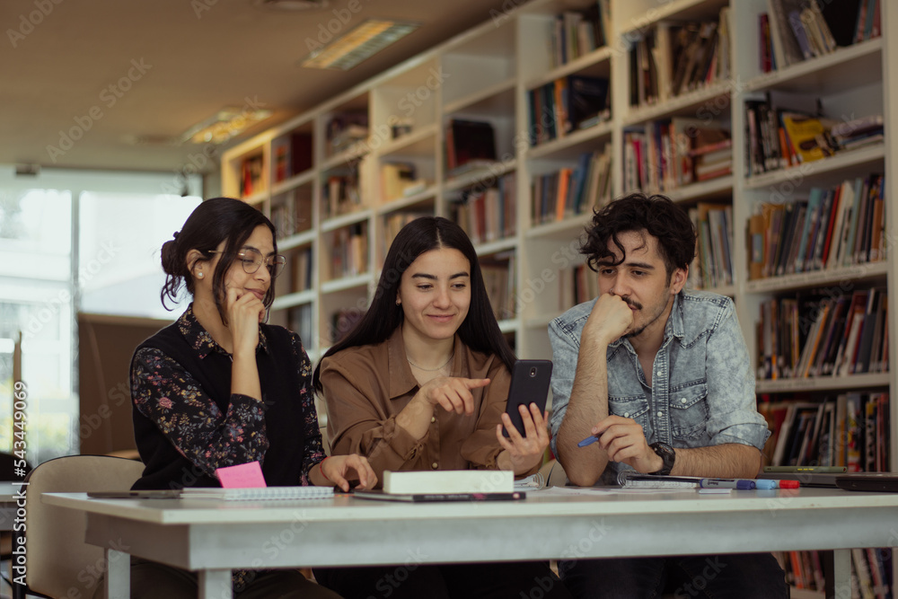 Group of diverse colleagues working on the computers in the modern ...
