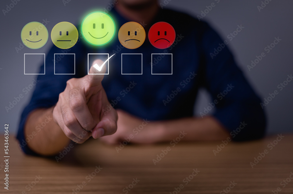 Customer service evaluation concept. smiling Asian female Is using a ...