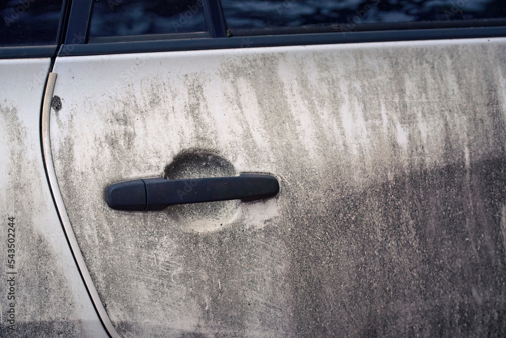 Dirty exterior door handle of vehicle. Dirty white car side view ...